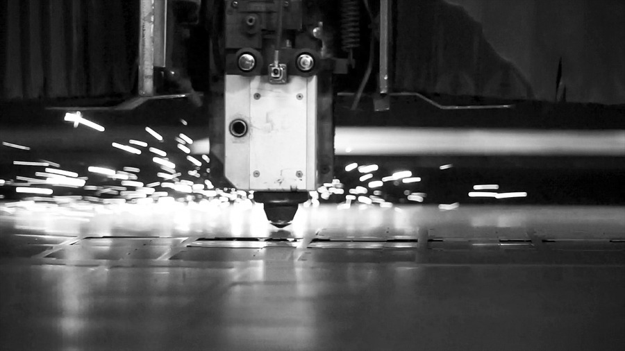 Testing laser power in laser cutting system manufacturing to improve ...